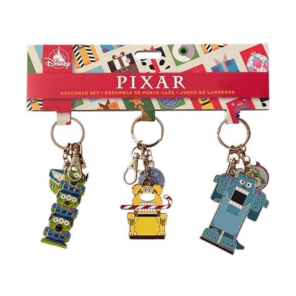 Disney | Accessories | Pixar Holiday Keychain Set Three Keychains ...